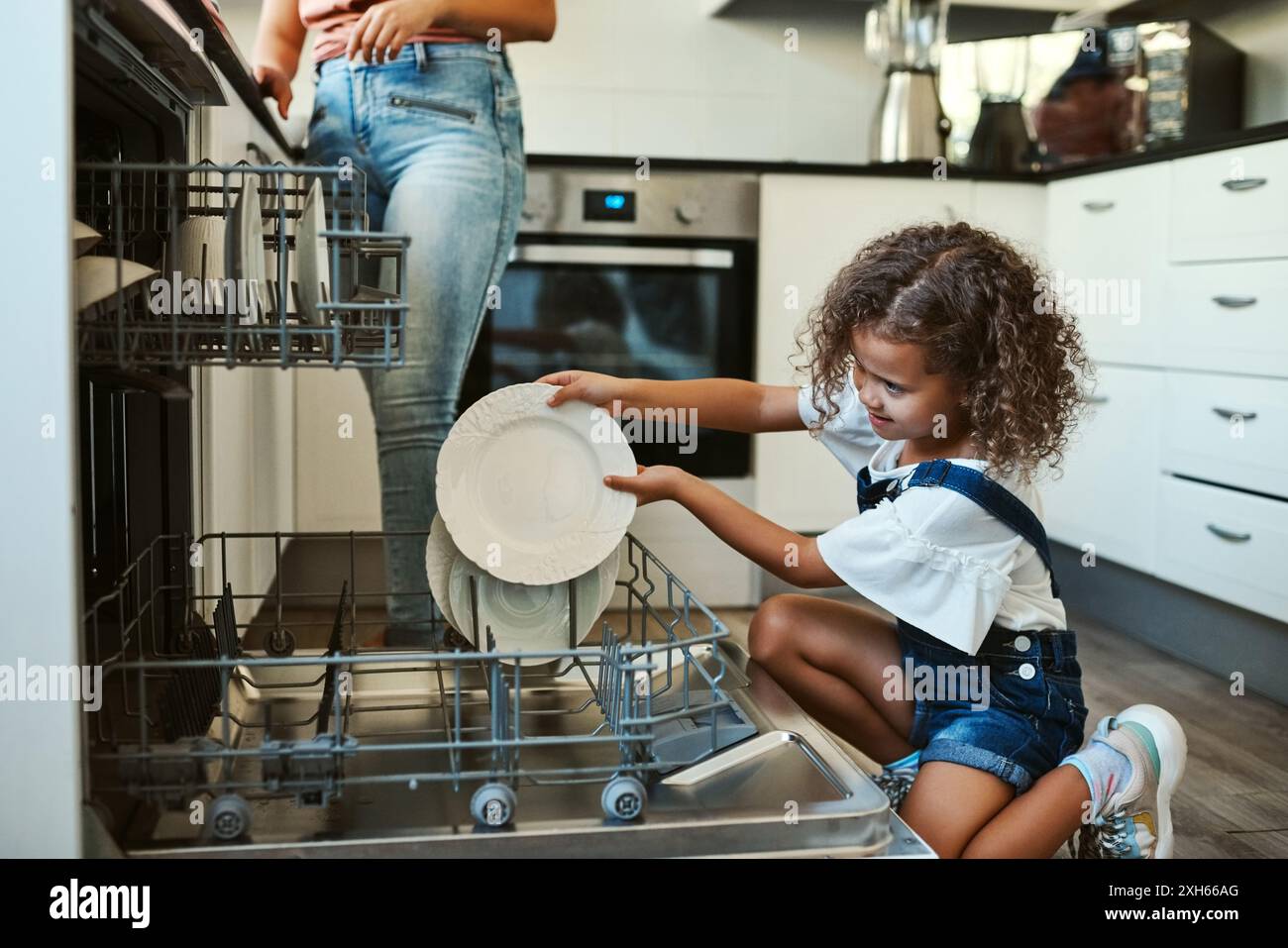 Child wash dishes machine hi-res stock photography and images - Alamy