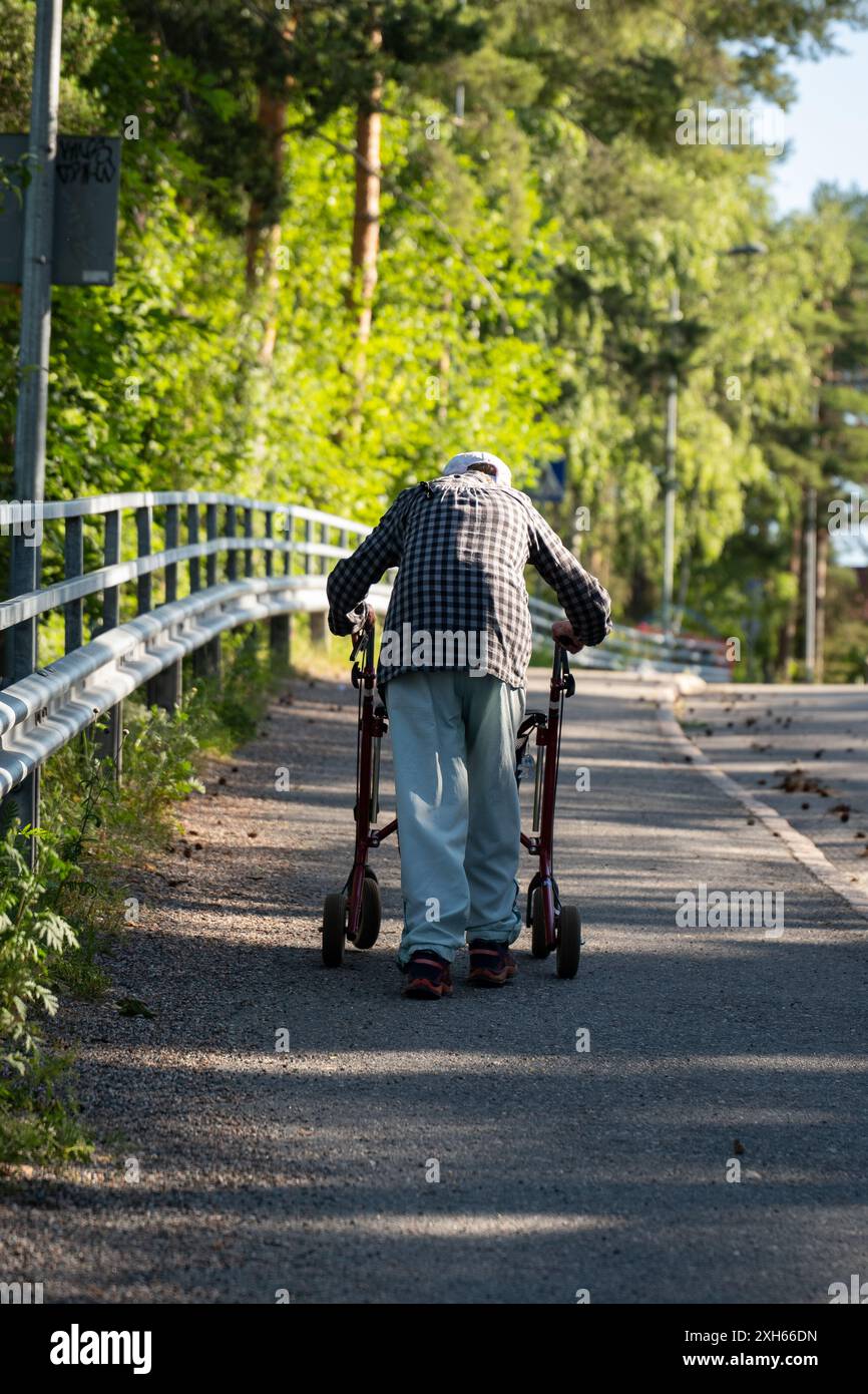 Elderly woman rollator wheeled hi-res stock photography and images - Alamy
