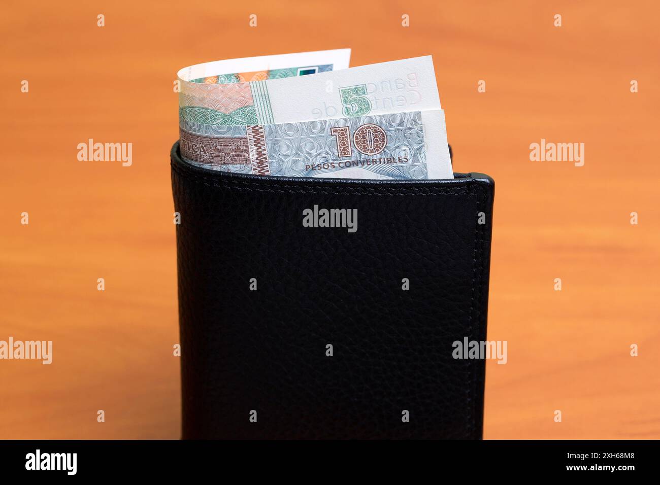 Cuban money - Convertible Pesos in the black wallet Stock Photo - Alamy