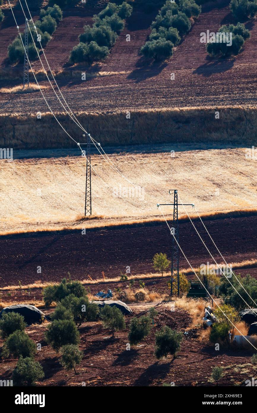 Power line crossing the fields in Alhambra Stock Photo - Alamy