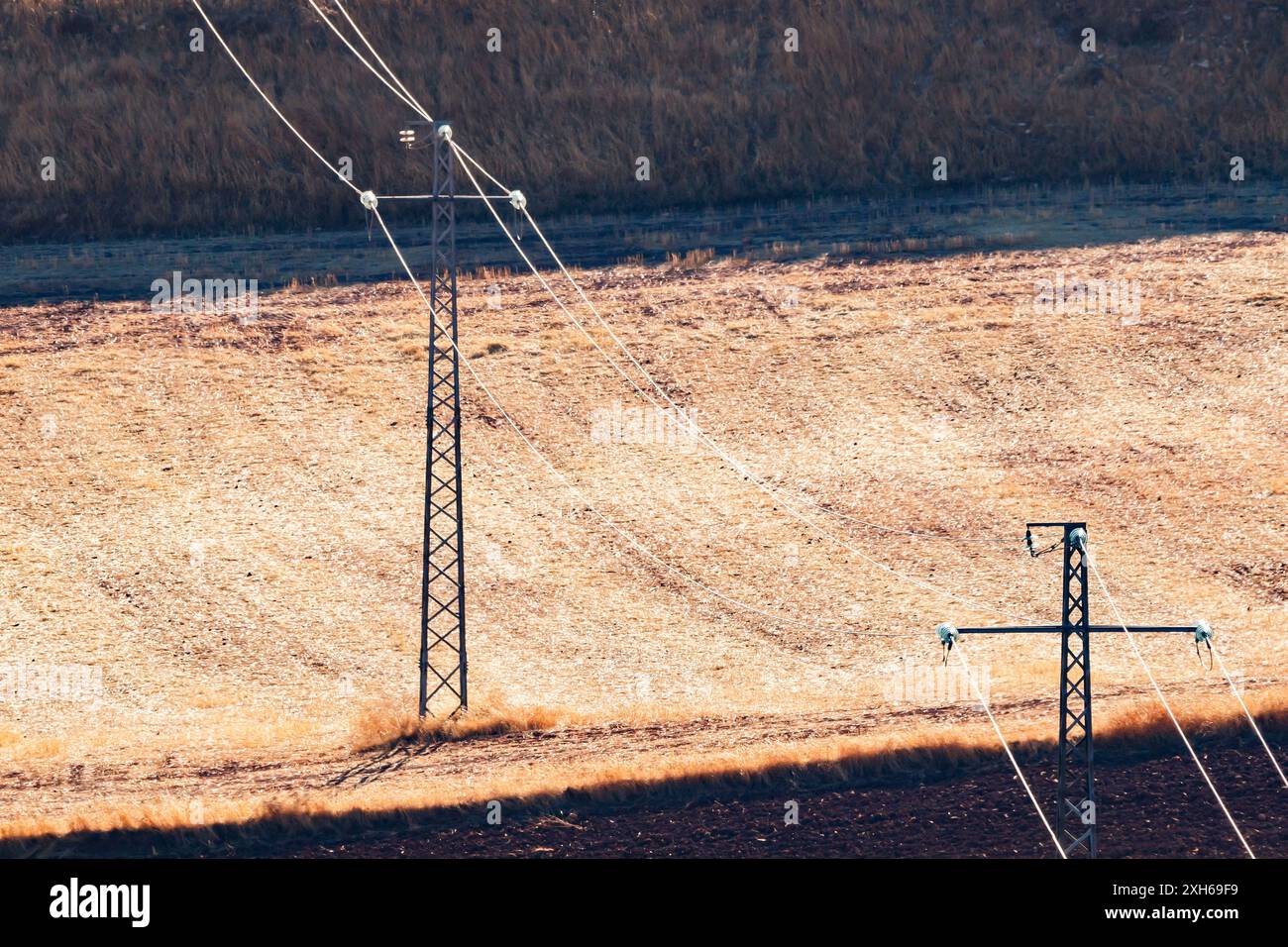 Power line crossing the fields in Alhambra Stock Photo - Alamy
