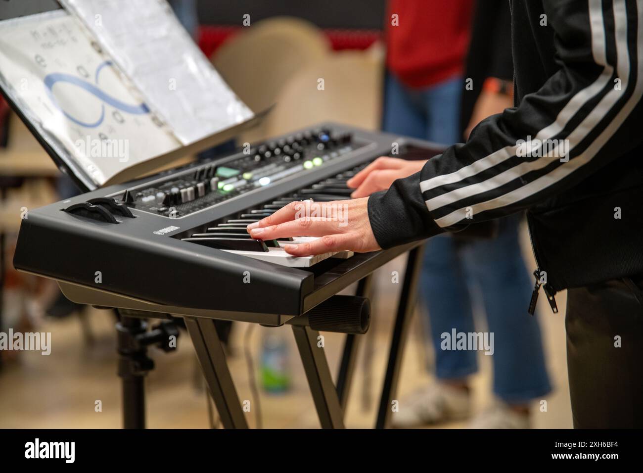 02 July 2024, Bavaria, Nuremberg: A woman plays notes on an electric ...
