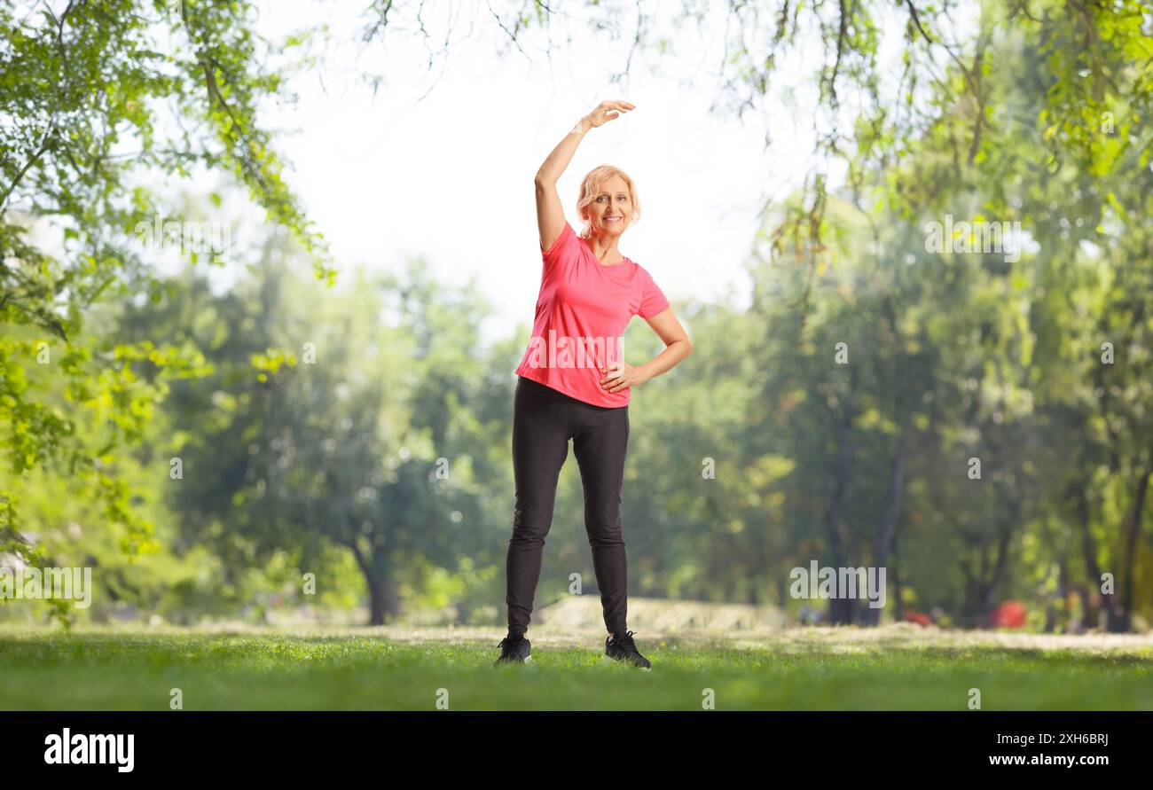 Mature woman body stretching workout hi-res stock photography and ...