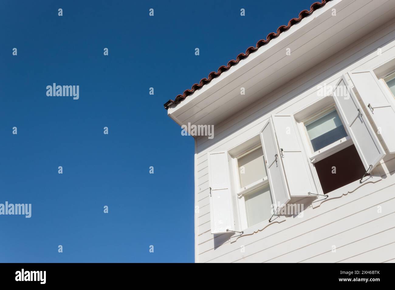Wooden window with grille of wooden house Stock Photo - Alamy