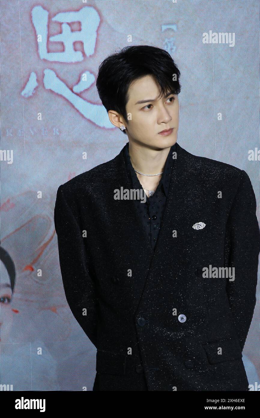 Chinese actor, singer, and dancer Tan Jianci attends an activity in ...