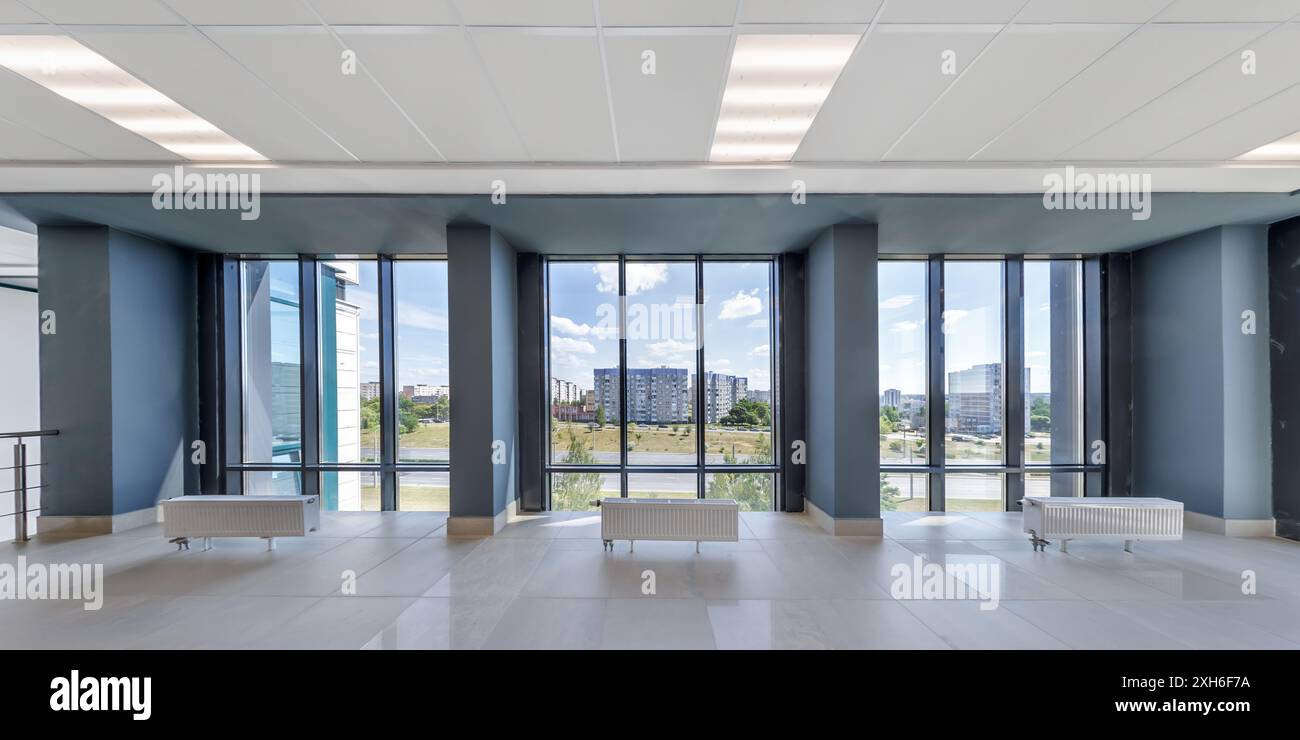 panorama view in empty modern hall with columns, doors and panoramic ...