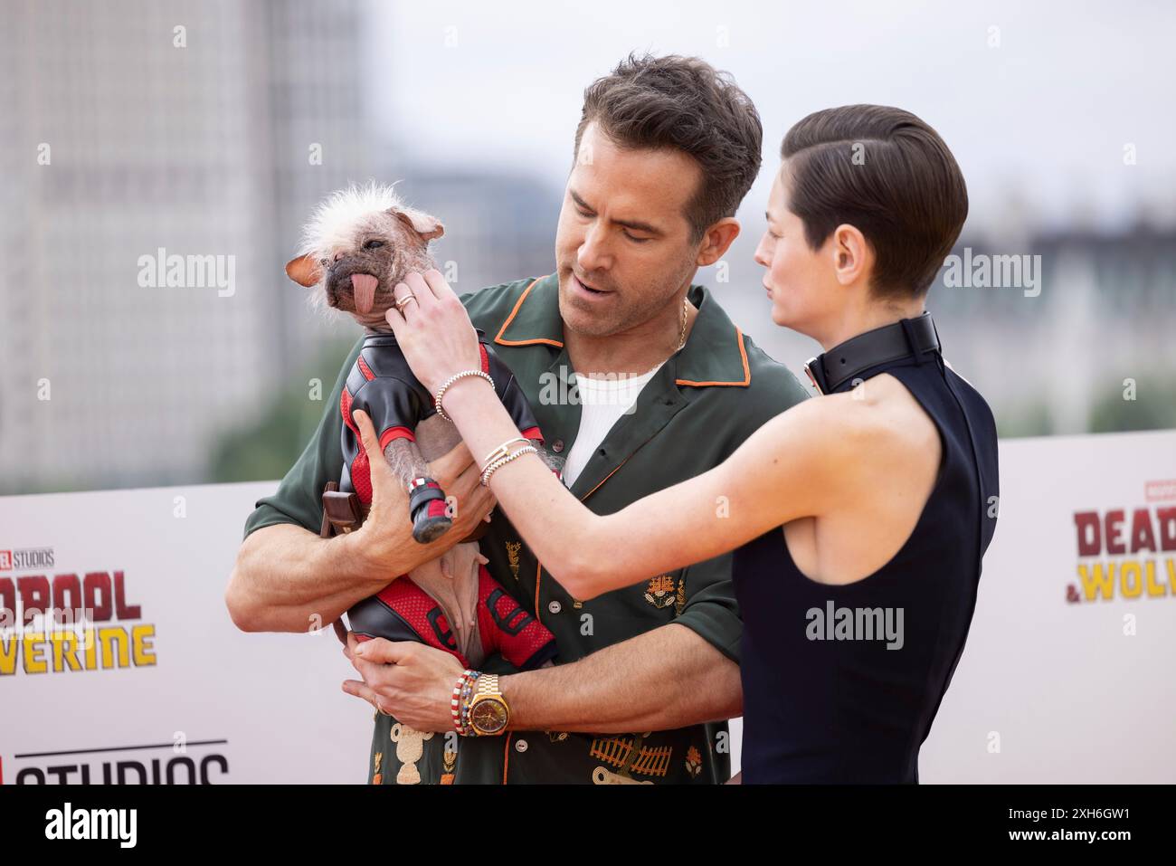 Peggy a.k.a. Dogpool, the "UK's Ugliest Dog Winner", from left, Ryan Reynolds and Emma Corrin ...