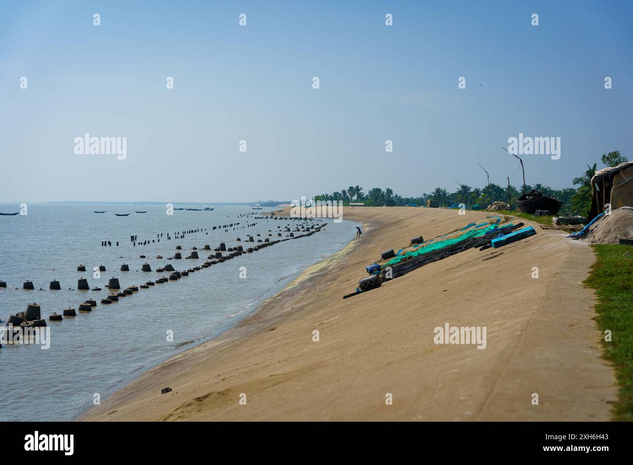Embankments on the of indian Sundarbans to protect the land from ...