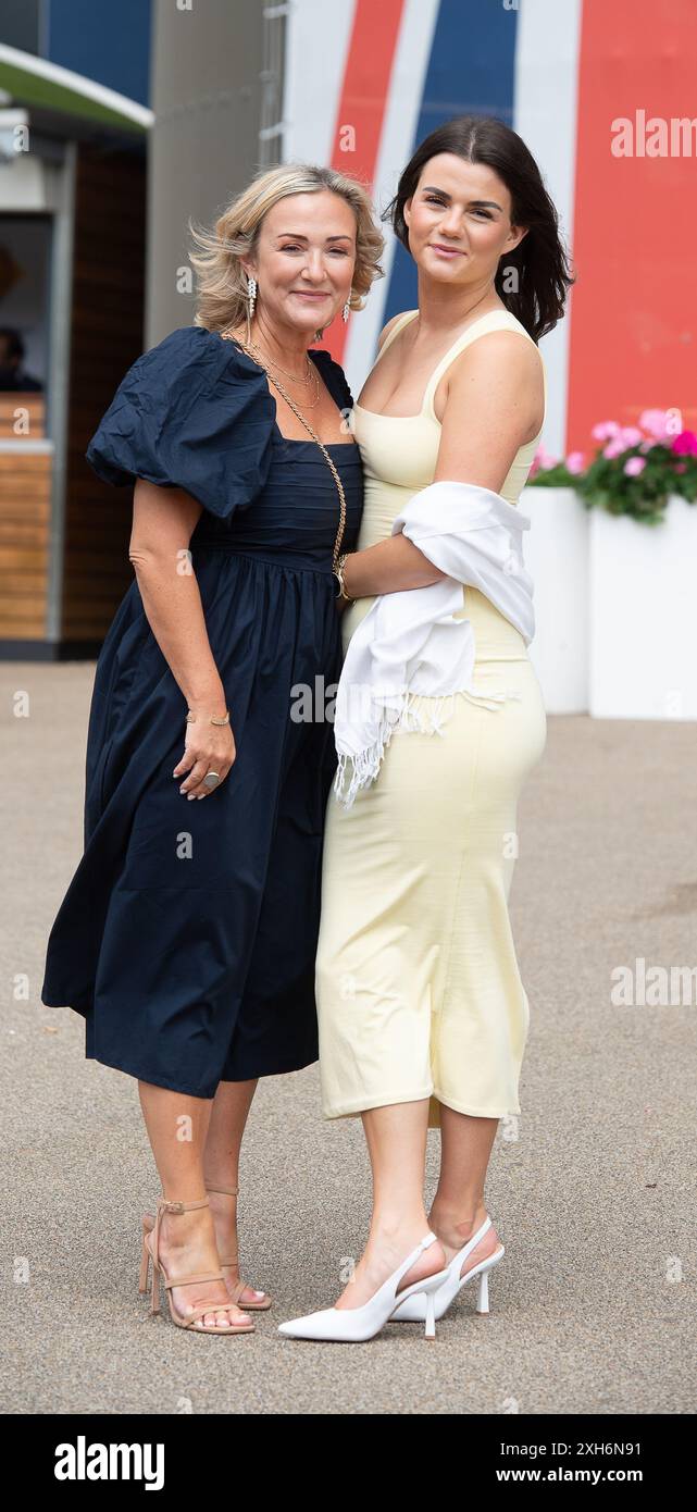 Ascot, Berkshire, UK. 12th July, 2024. Racegoers enjoying their day at ...
