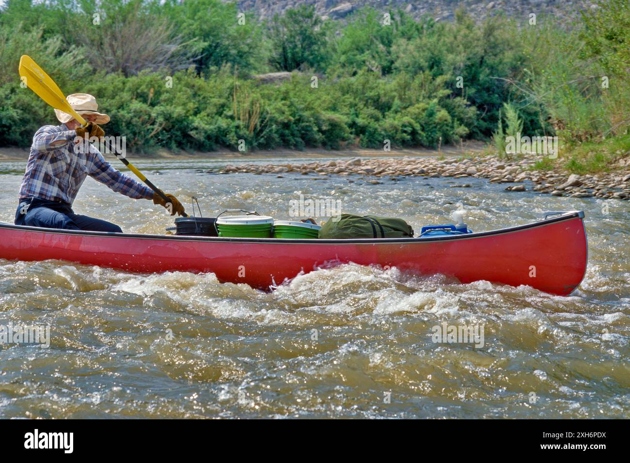 Canoeist entering rapids at The Lower Canyons of Rio Grande, Black Gap ...