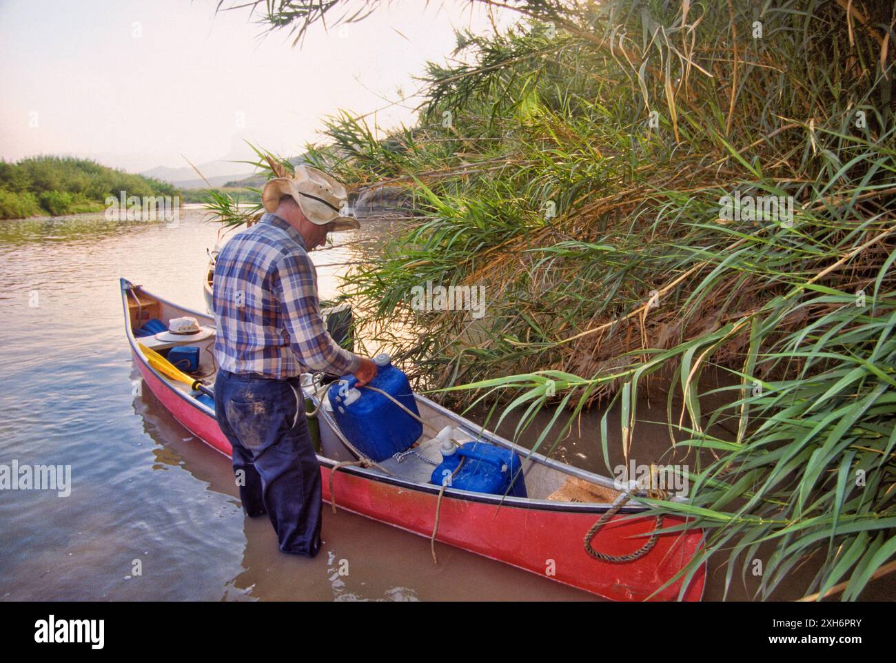 Canoeist at hot springs at Rio Grande river-bank, The Lower Canyons of ...