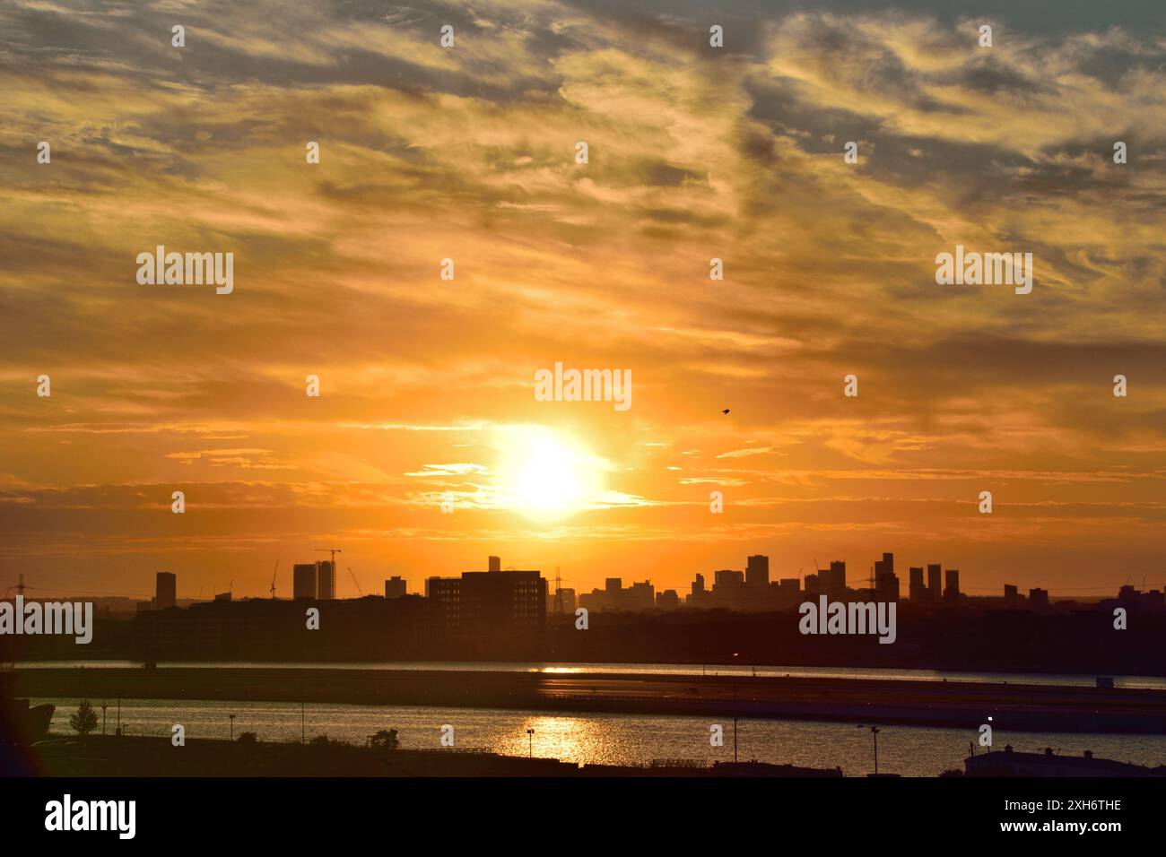 Royal Docks Simmer sunset - a view looking North across Newham towards ...