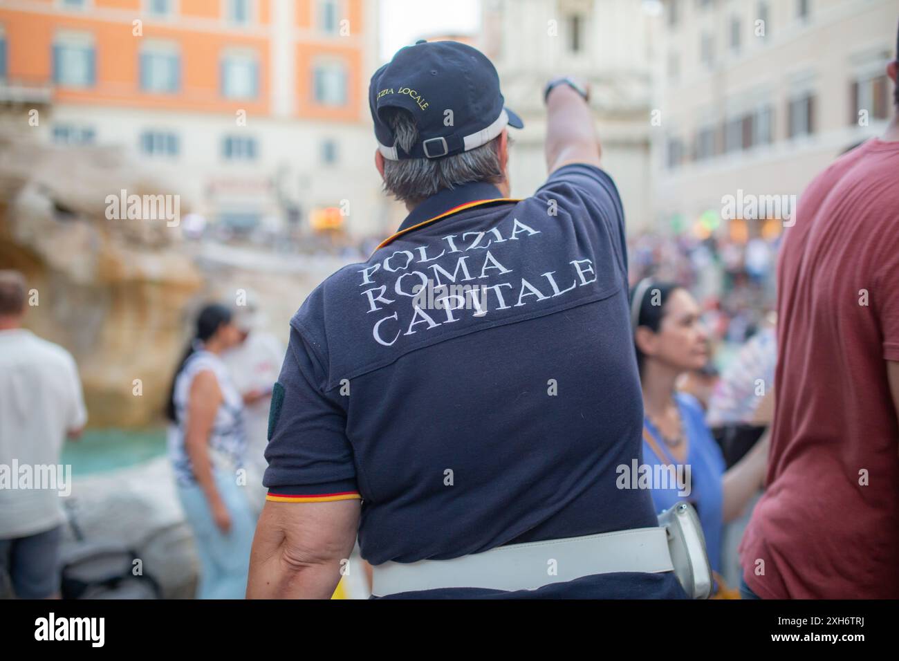 Rome, Italy - June 28, 2024: Police officer at the Trevi Fountain in ...