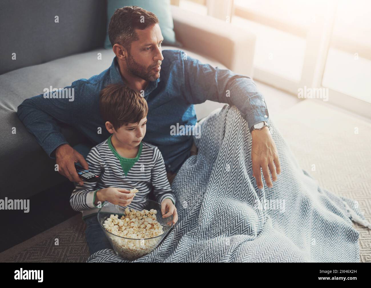 Father son watching movies hi-res stock photography and images - Alamy