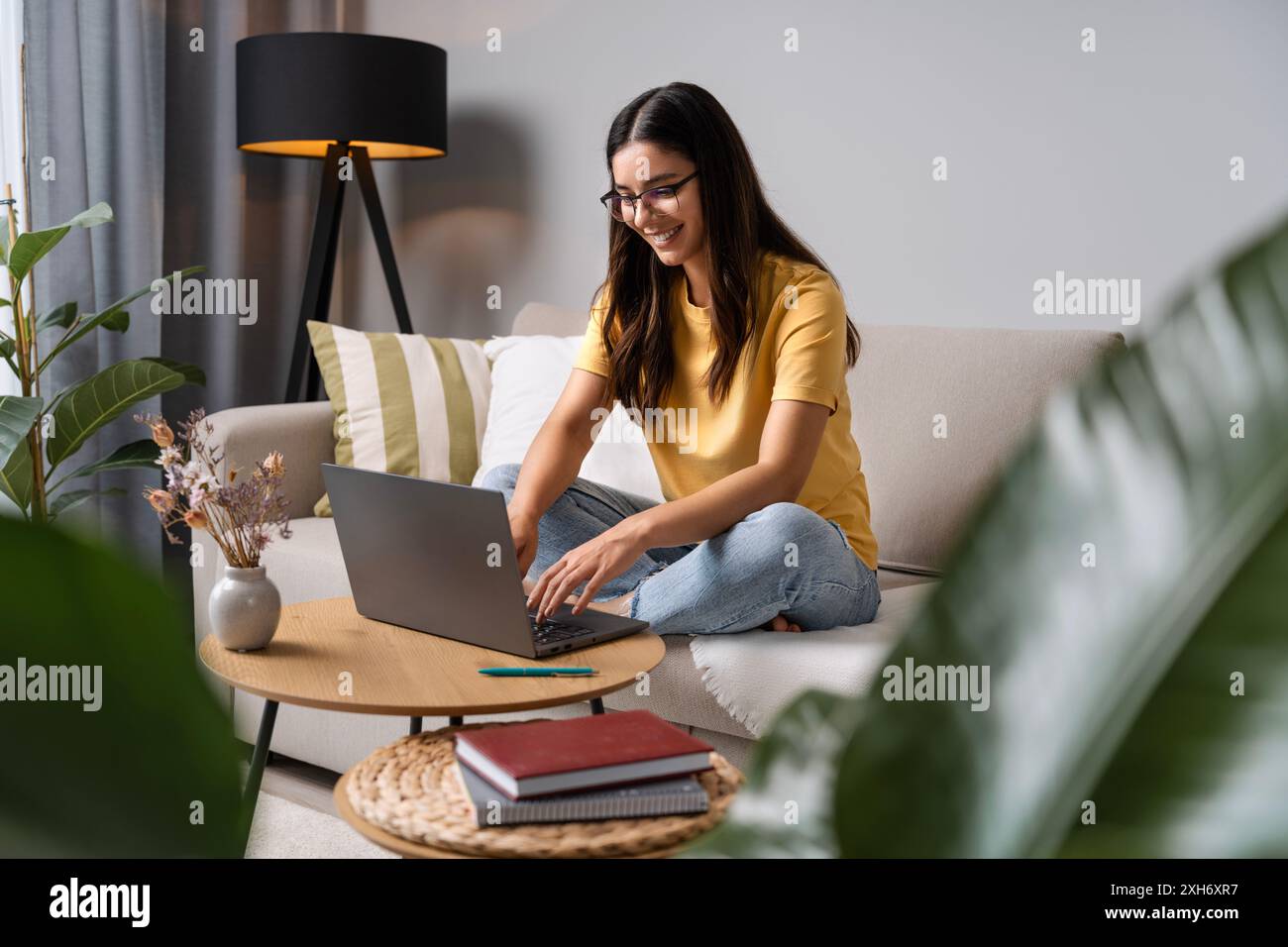 Study chic. This girl is all smiles as she tackles her homework from ...
