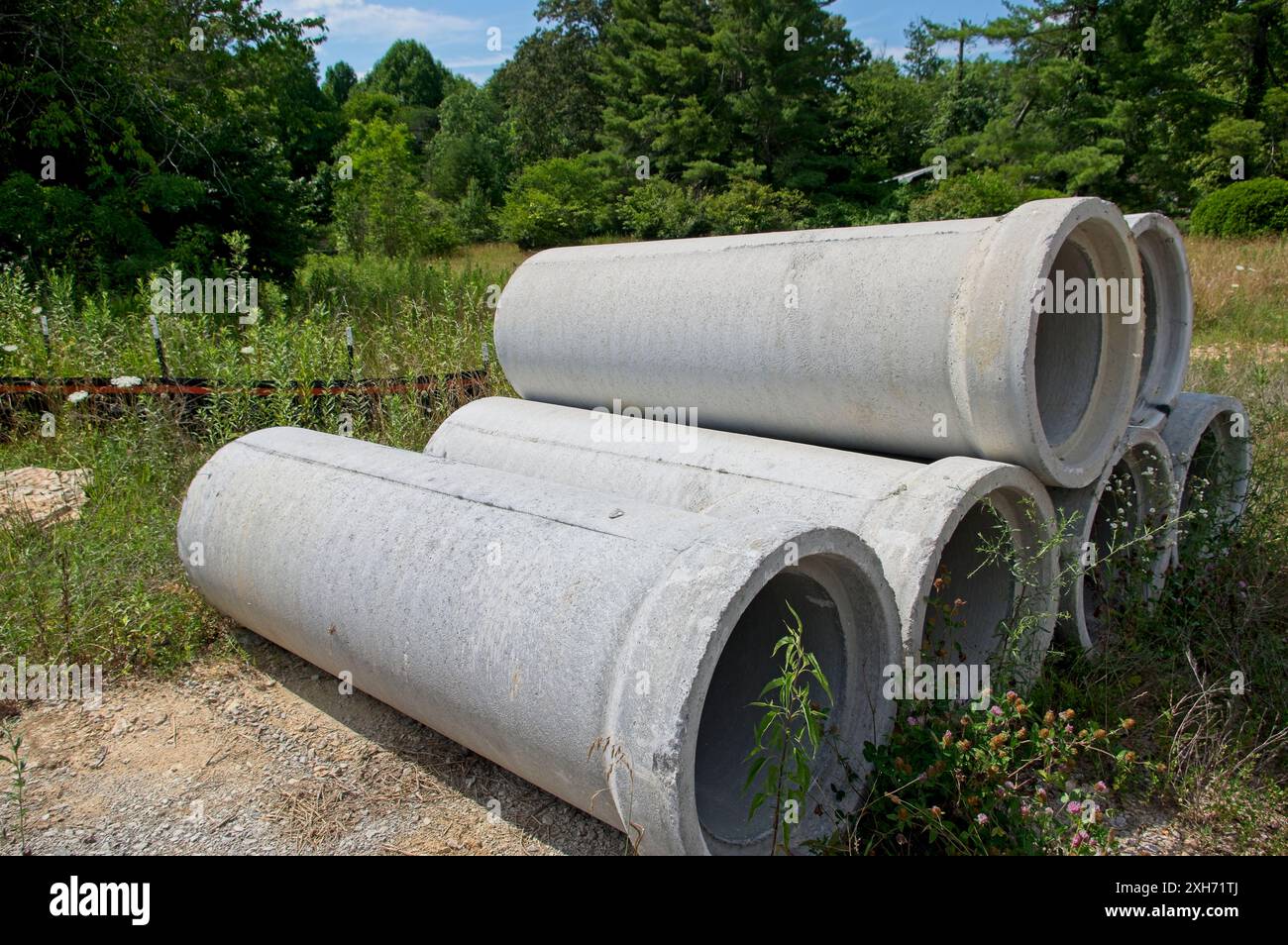Concrete drainage pipes stacked for construction hi-res stock ...