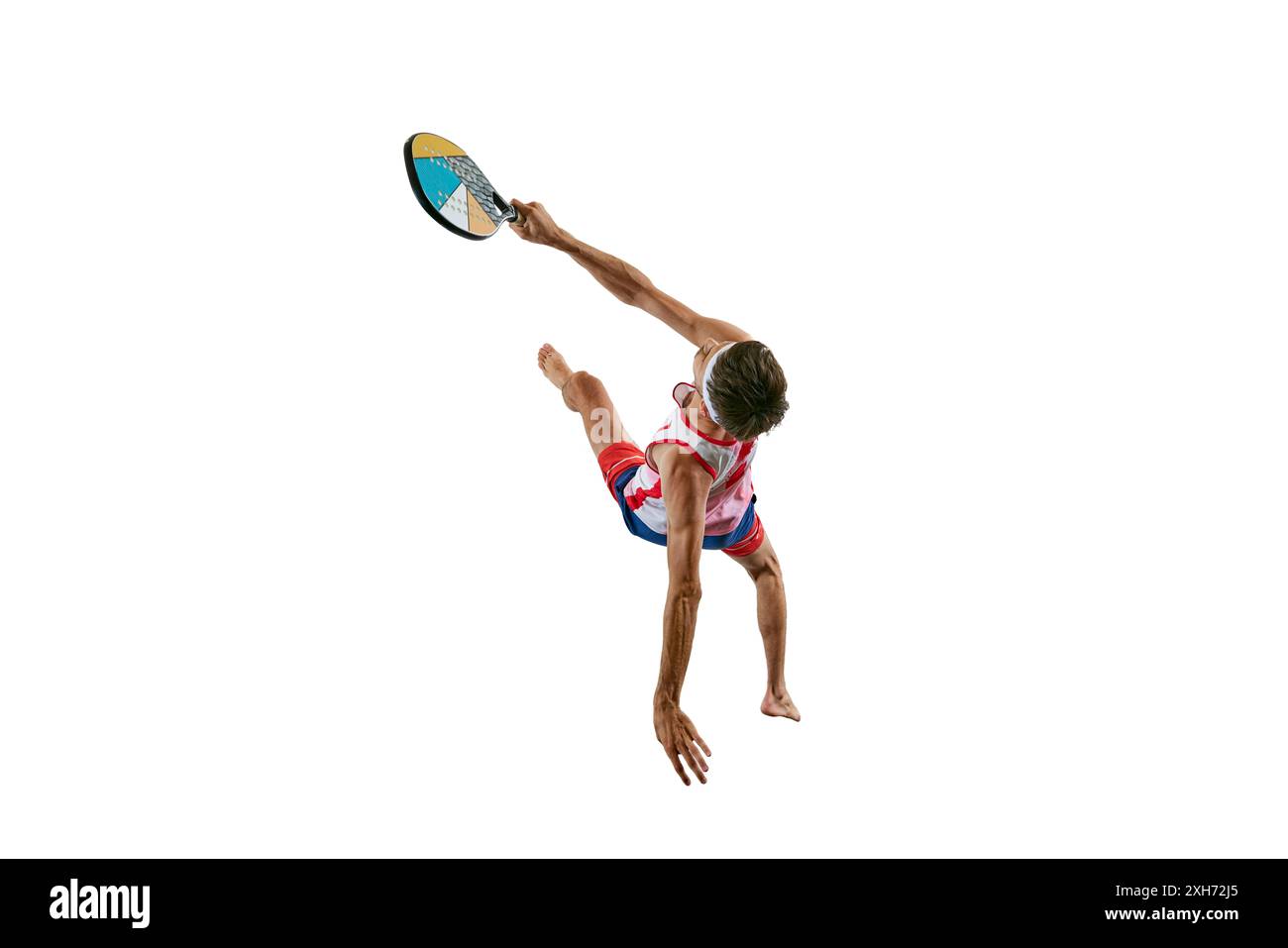 Sportive young man in sportswear, padel tennis player in motion ...