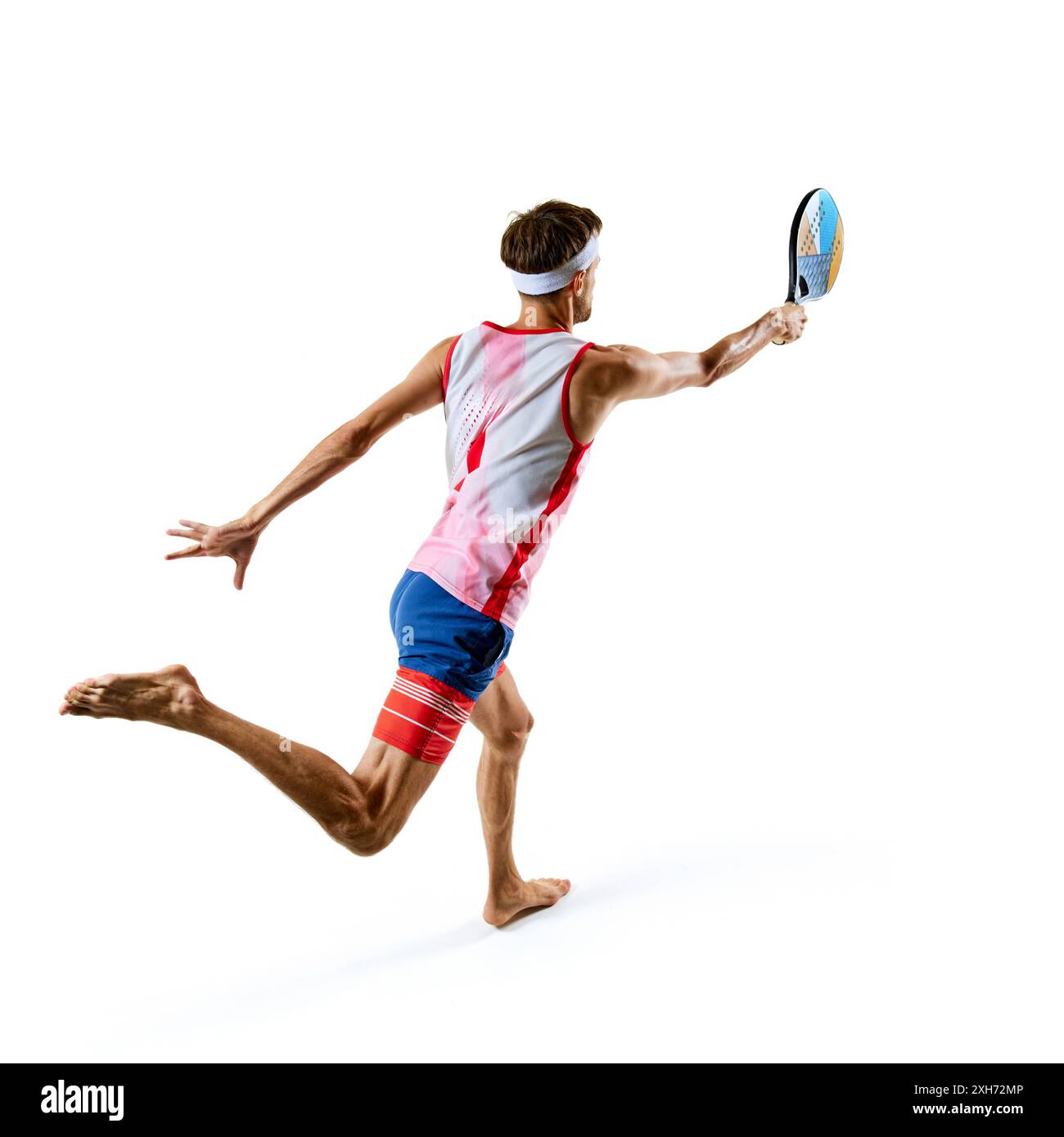 Dynamic image of young man, beach tennis player showing his motivation ...