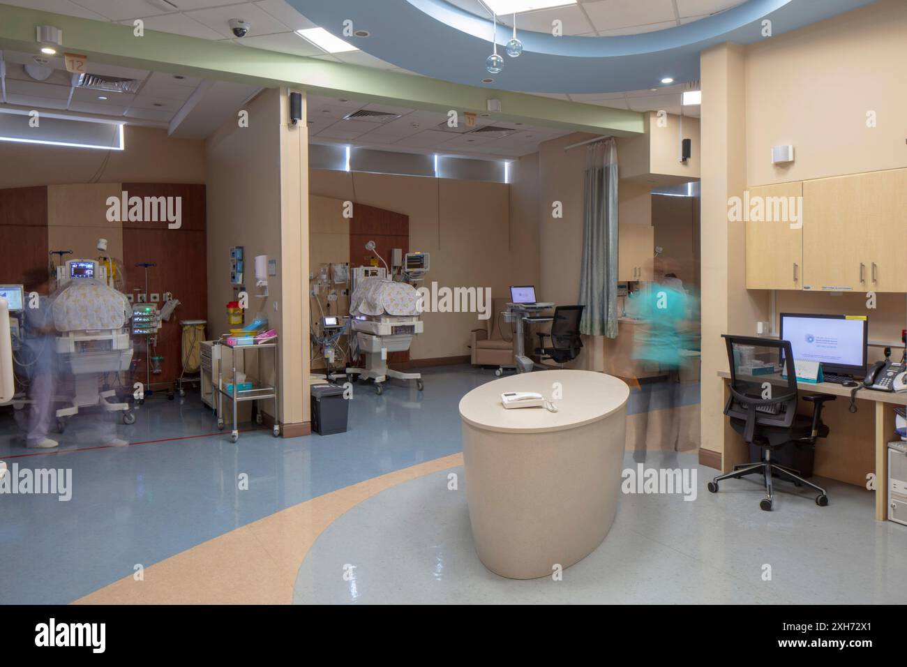 Triage area with booths and nurse station. Danat Al Emarat Women and ...