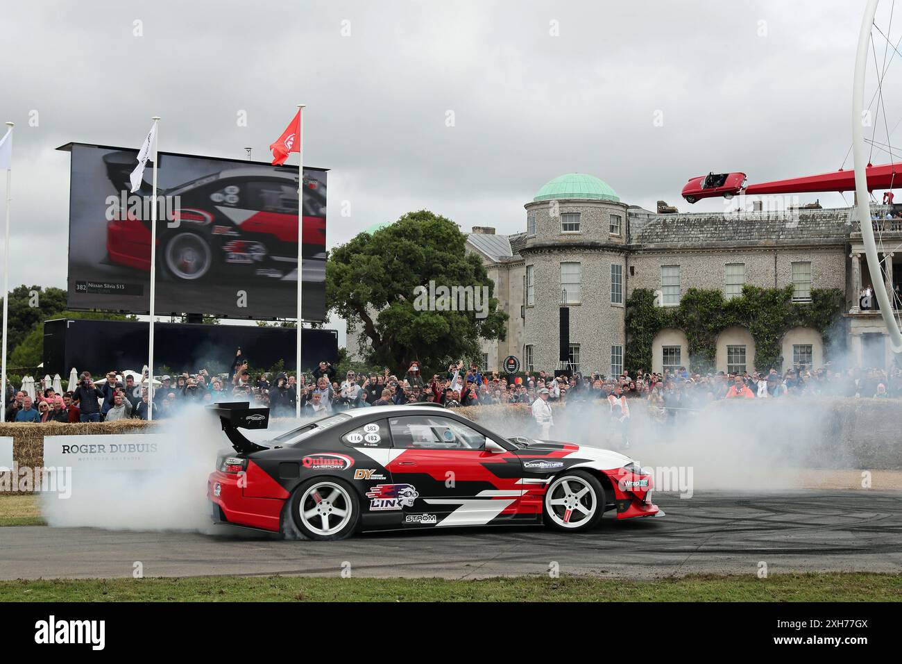 Goodwood, West Sussex, UK 12th July 2024. Drifting in front of Goodwood ...