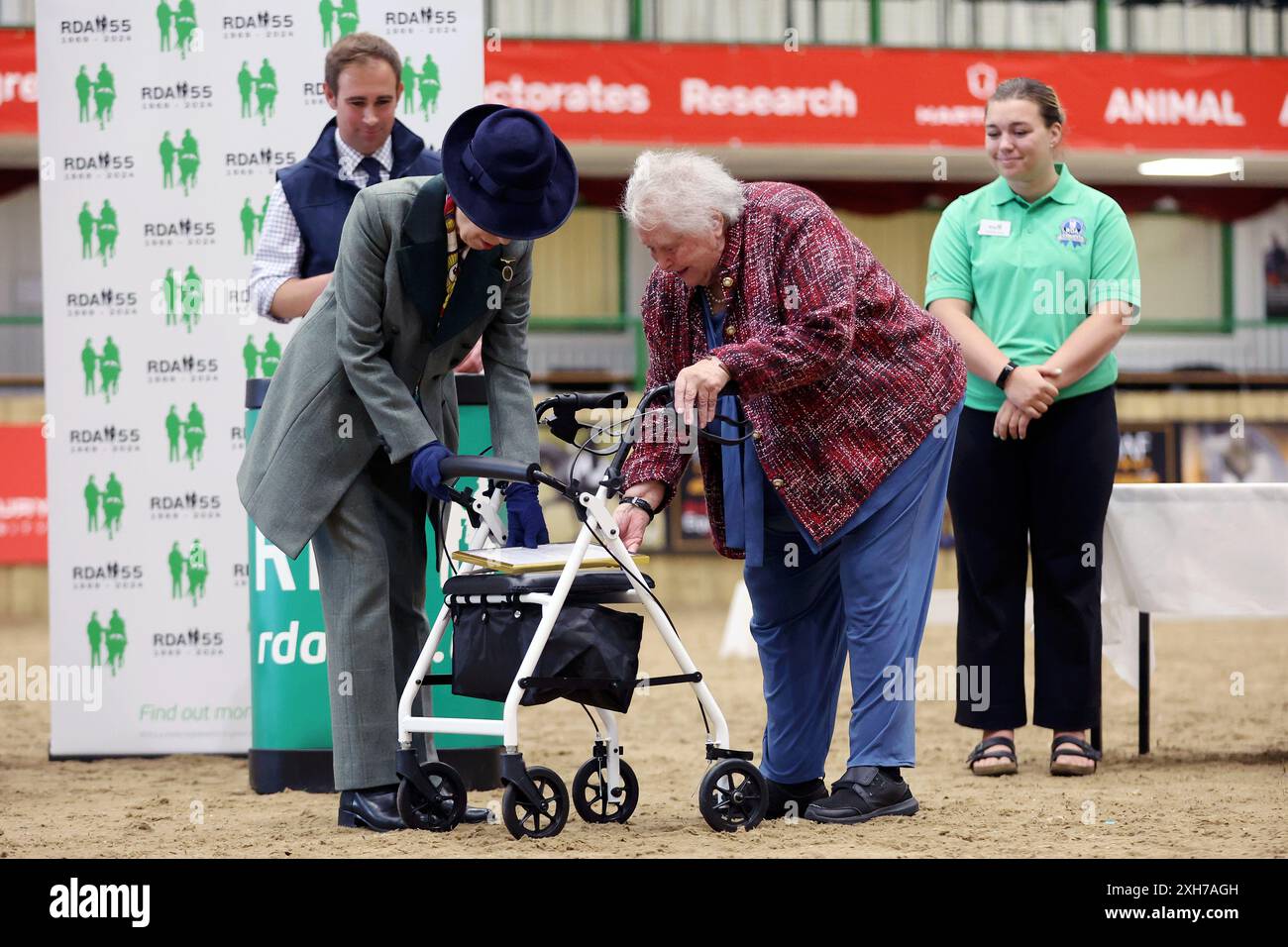 The Princess Royal presents an award during the Riding for the Disabled ...