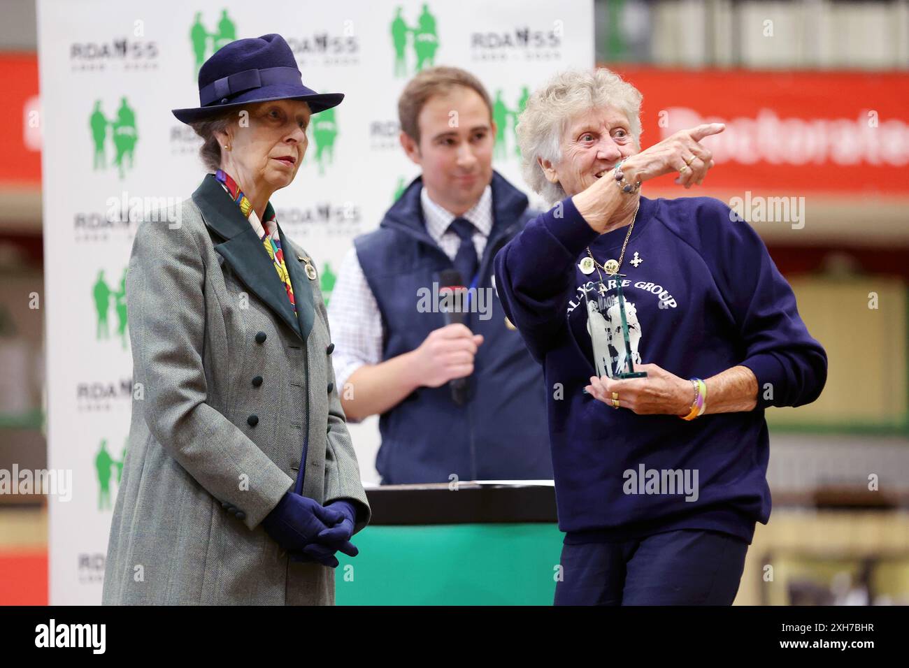 The Princess Royal presents an award during the Riding for the Disabled ...