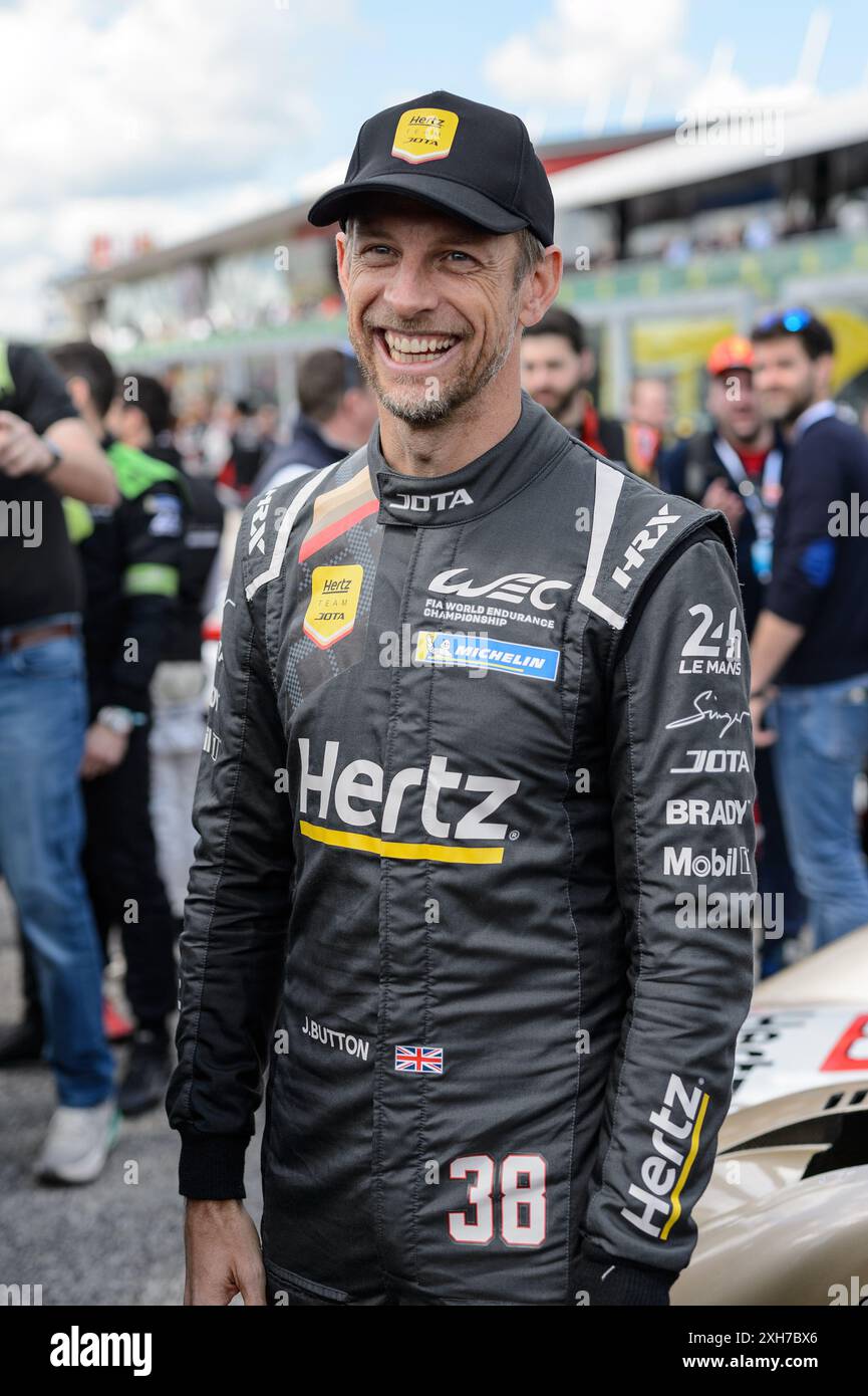Jenson BUTTON (GBR) of HERTZ TEAM JOTA #38 jokes with people on the ...
