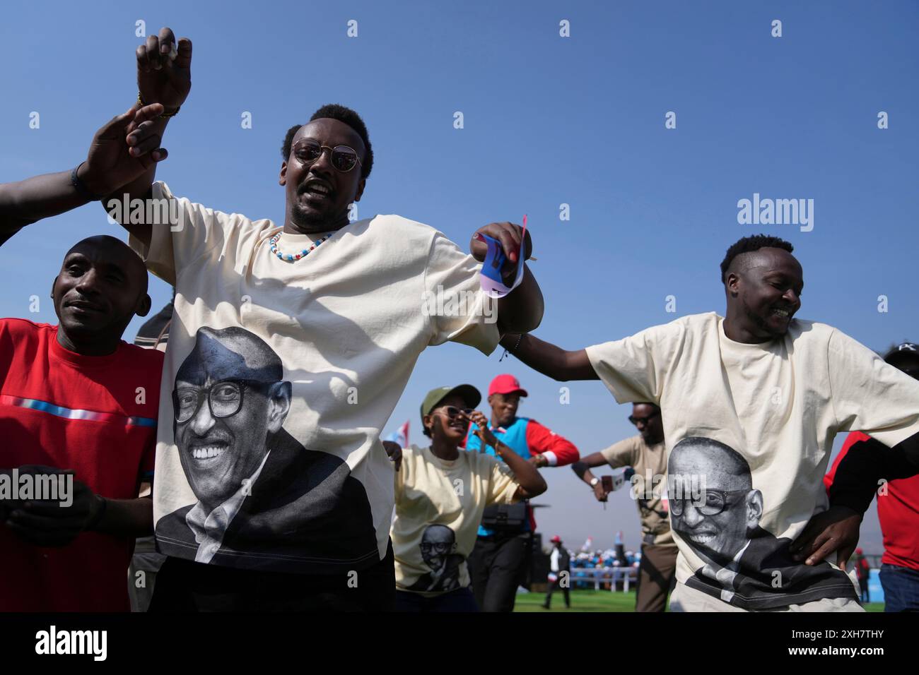 Supporters of Rwanda's President Paul Kagame dance during an election ...
