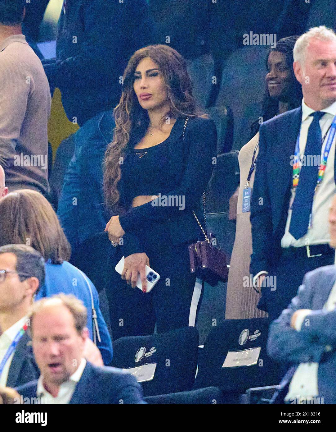 Clarence Seedorf (u-l) with wife Sophia Makramati, in the semi final match NETHERLANDS, UK ...