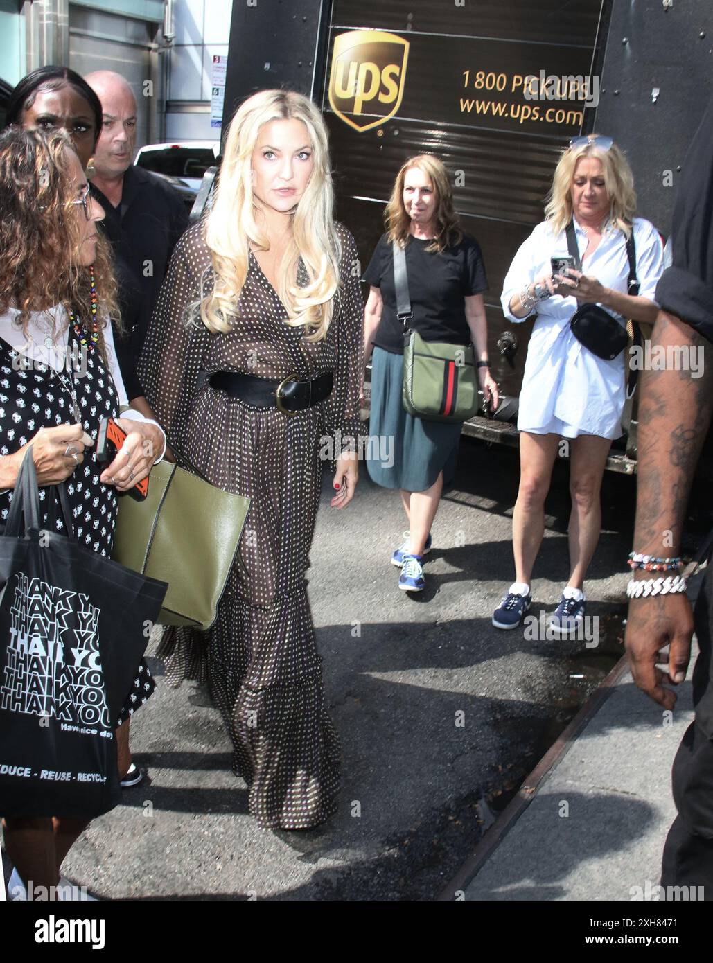 July 11, 2024 Kate Hudson arriving to sign her new album Glorious at ...