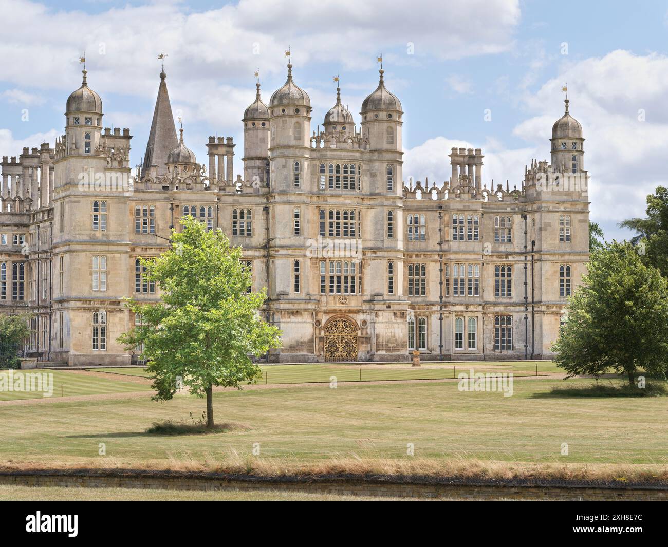 West facade of Burghley House, a sixteenth century mansion built by ...