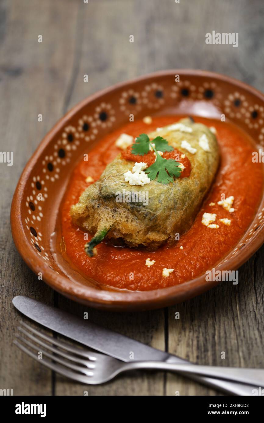 chile relleno (fried poblano pepper stuffed with minced meat and coated ...