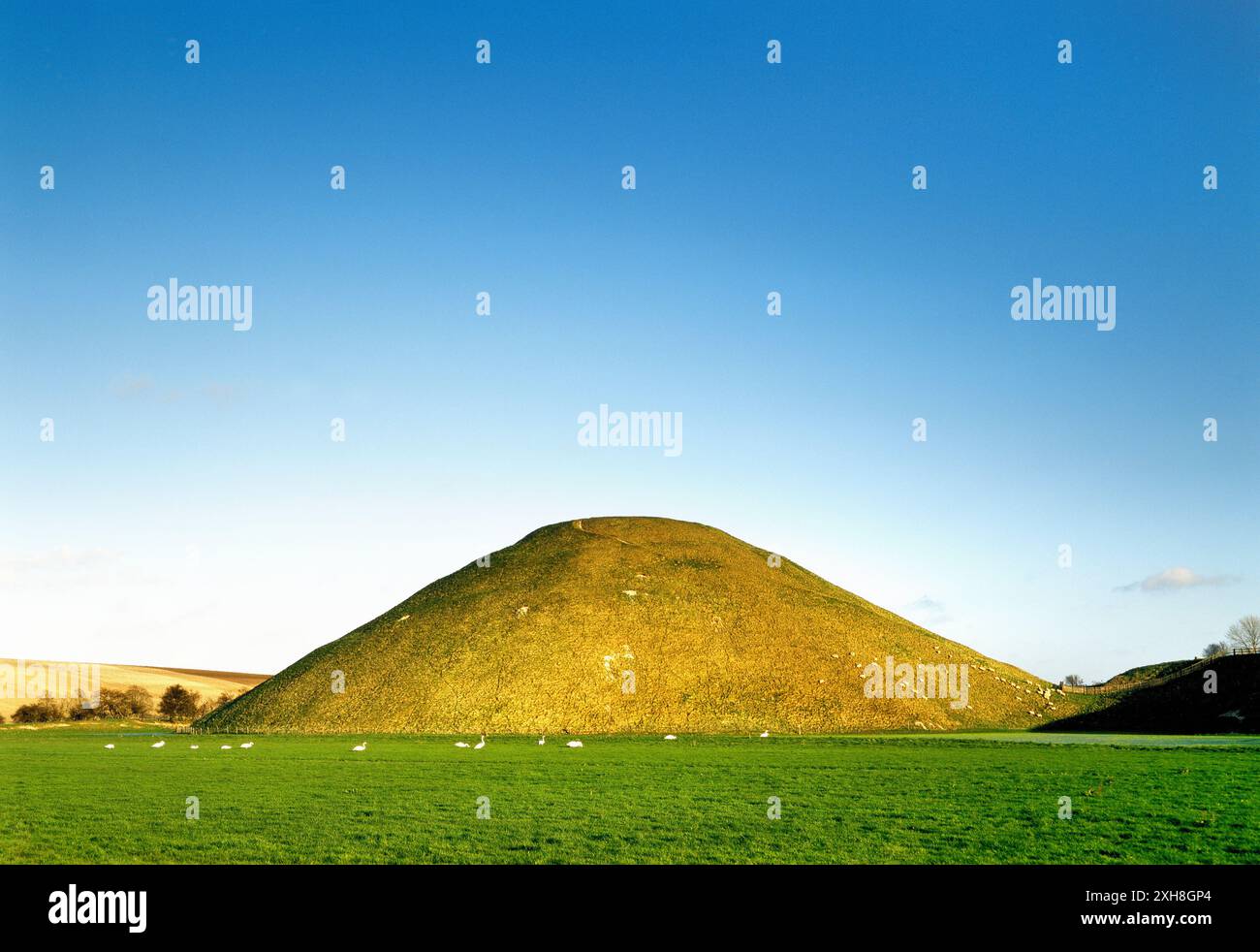 Silbury Hill prehistoric man made mound near the village and stone ...