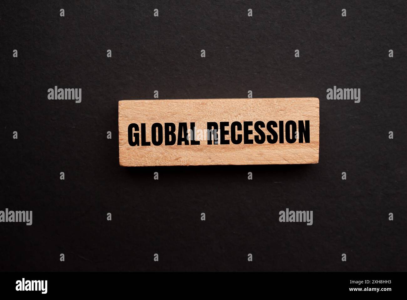 Global recession message written on single wooden block with black ...