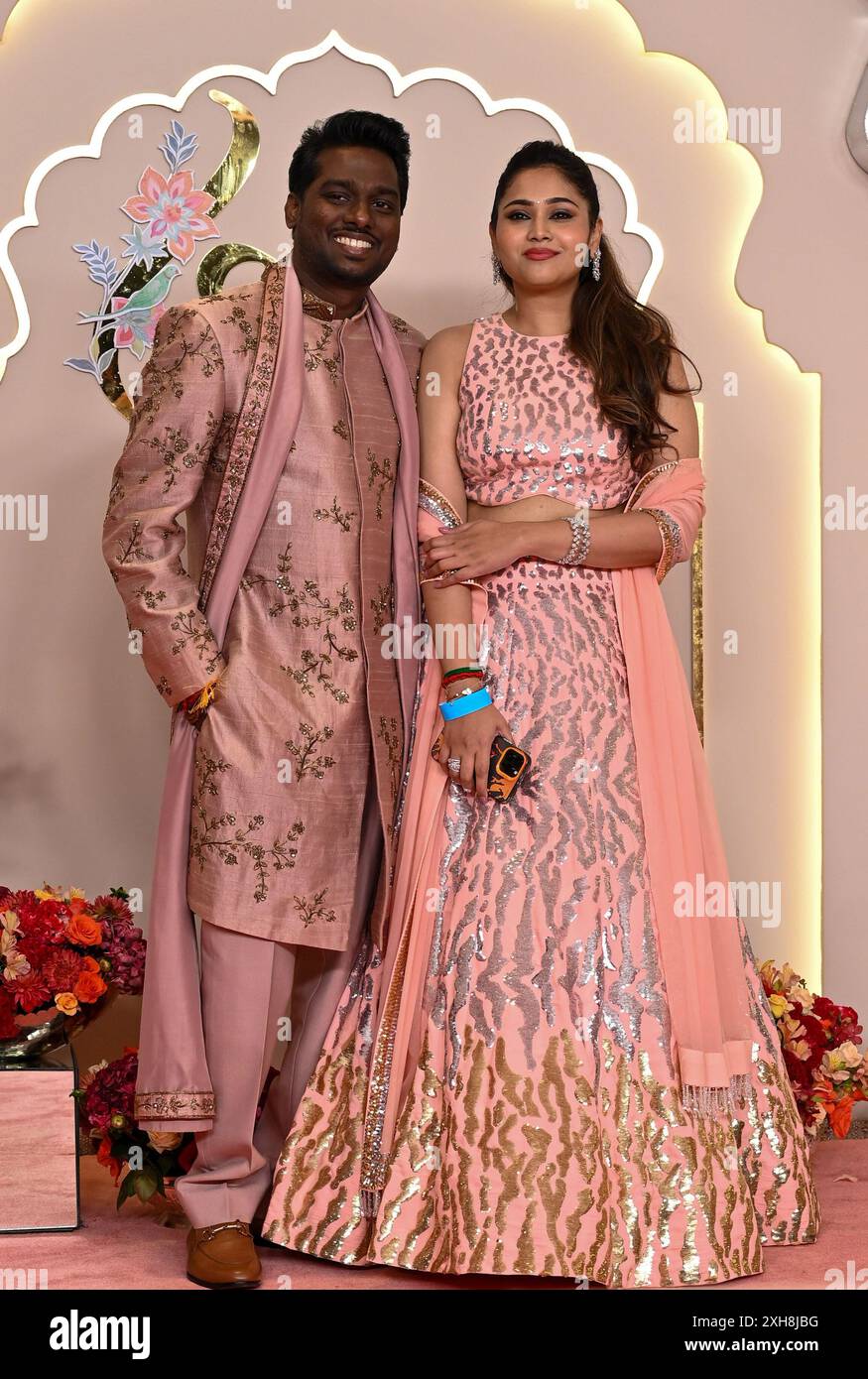 MUMBAI, INDIA - JULY 12: Indian film director Atlee Kumar and wife ...