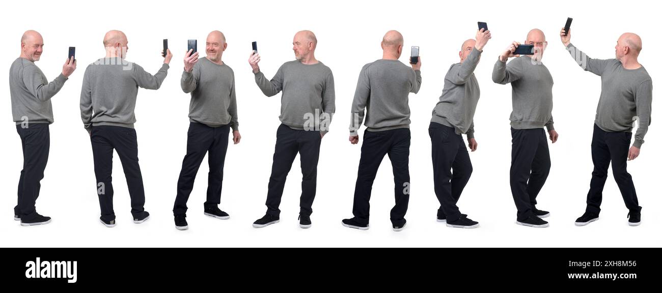 various posing of same man taking a self-portrait with smartphone on ...