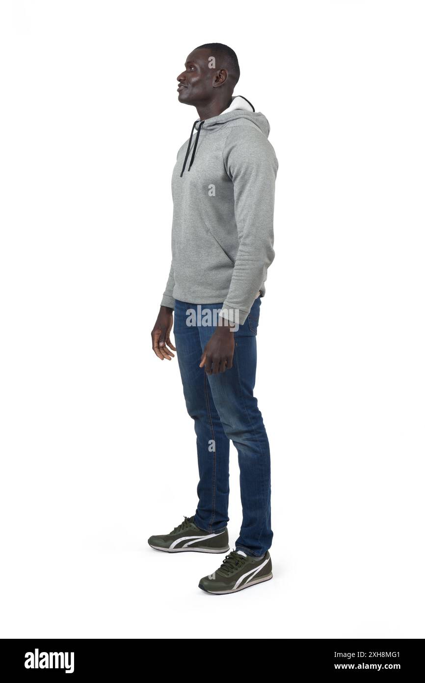 side view portrait of an african man standing on white background Stock ...