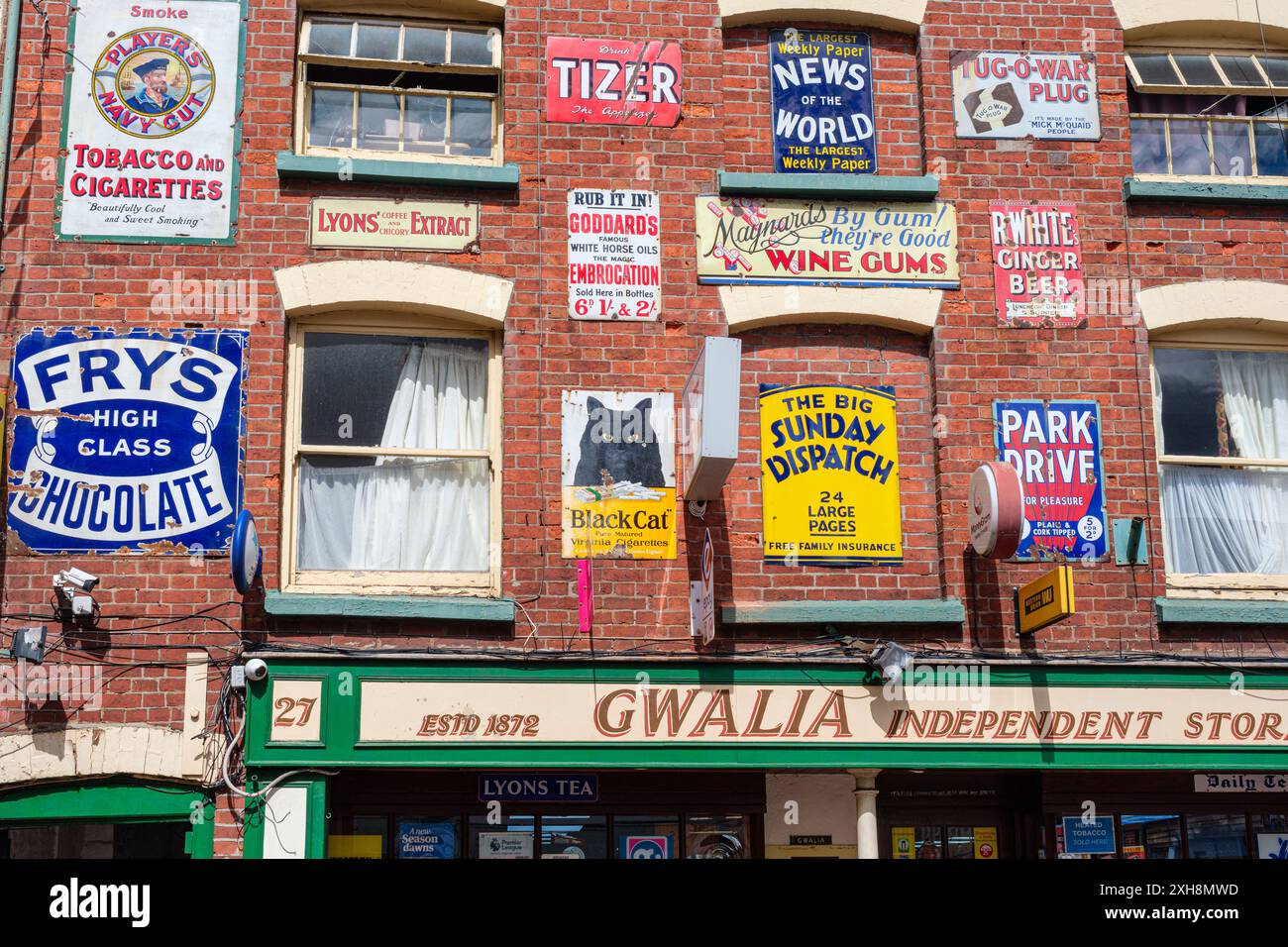 Victorian shop advertising signs hi-res stock photography and images ...