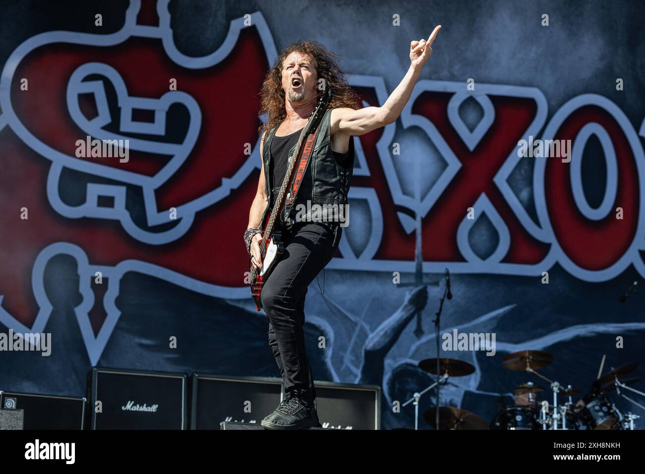 Nibbs Carter of Saxon live at Tons of Rock 2024 Stock Photo - Alamy
