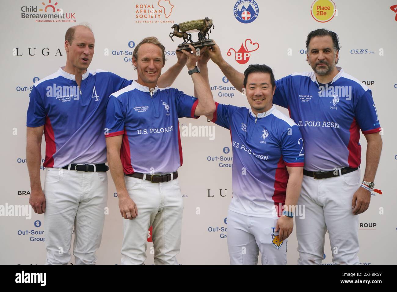 The Prince of Wales and his teammates (left to right) Mark Tomlinson ...