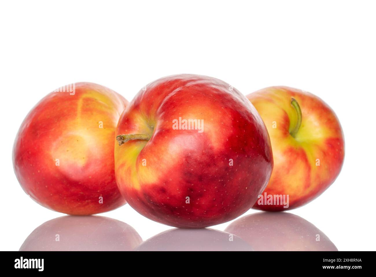 Three red apples, macro, isolated on white background Stock Photo - Alamy
