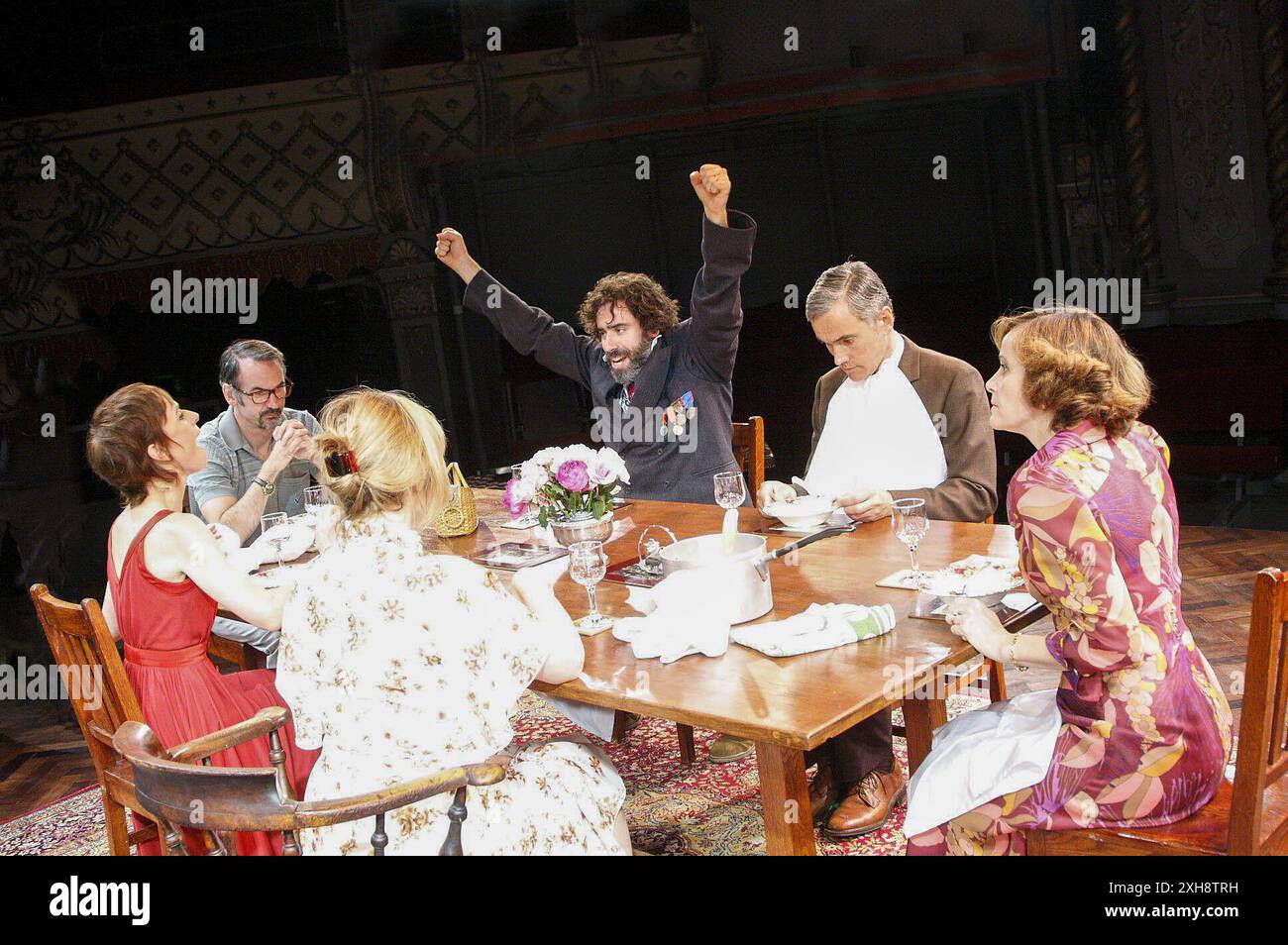 clockwise from centre: Stephen Mangan (Norman - arms raised), Ben Miles ...