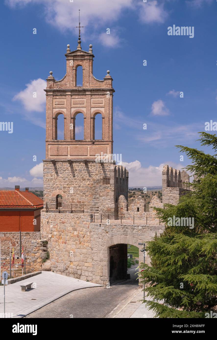 Spain, Castile and Leon, Avila, City walls with the brick steeple of ...