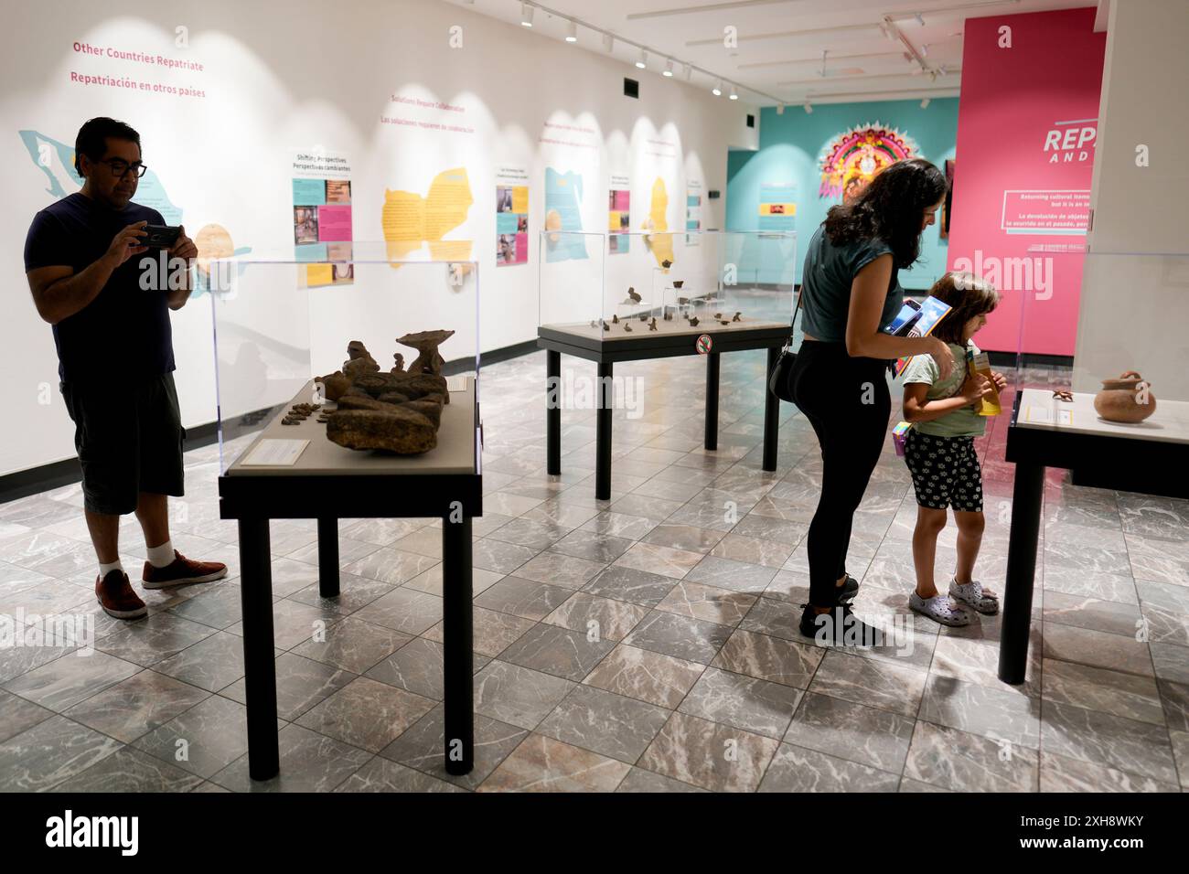 Guests visit the exhibit 'Repatriation and its Impact' at The Parthenon ...