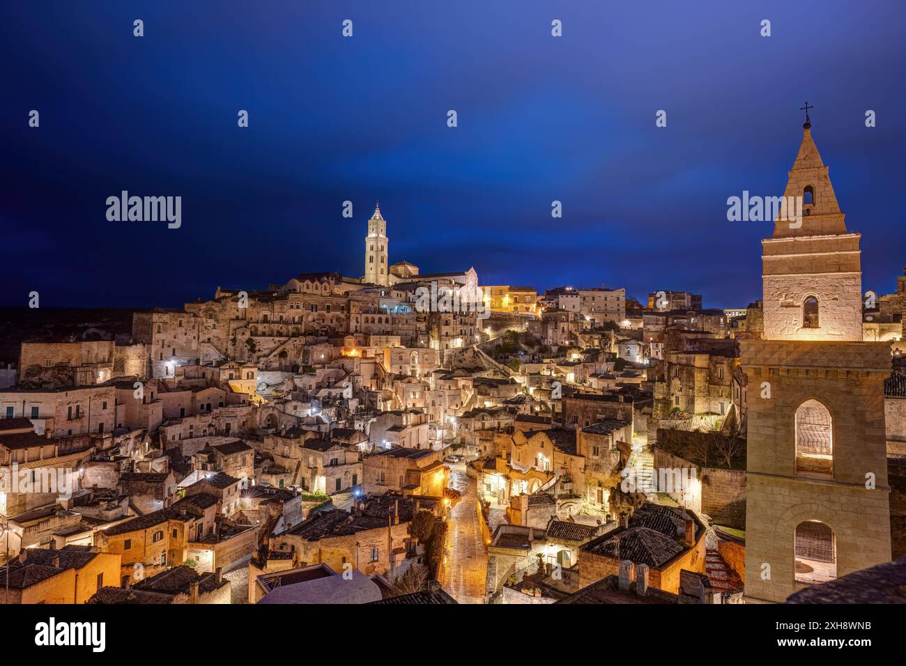 The medieval old town of Matera in southern Italy at night Stock Photo ...