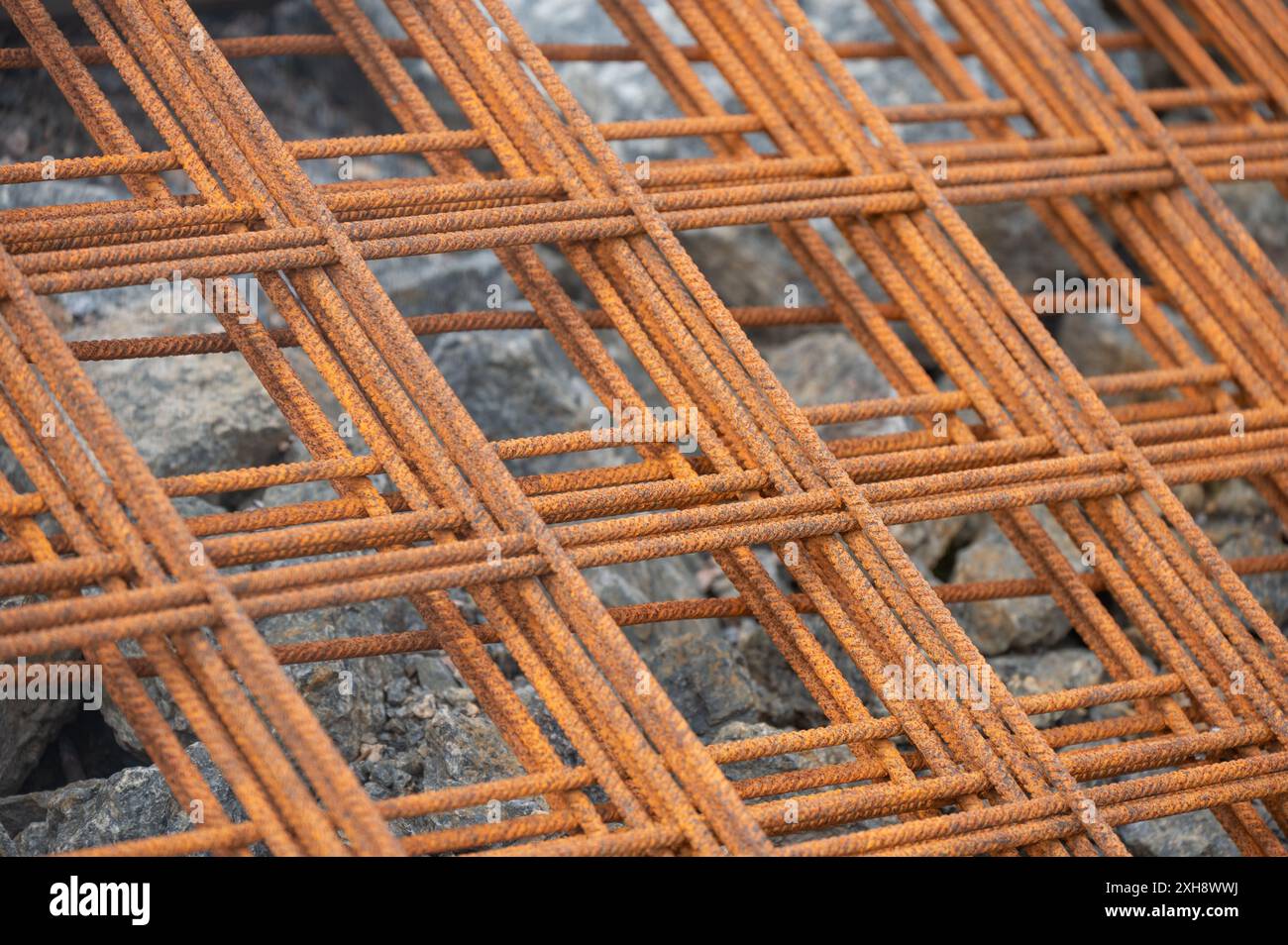 Stacked rebar at a building site exposed to the elements Stock Photo ...