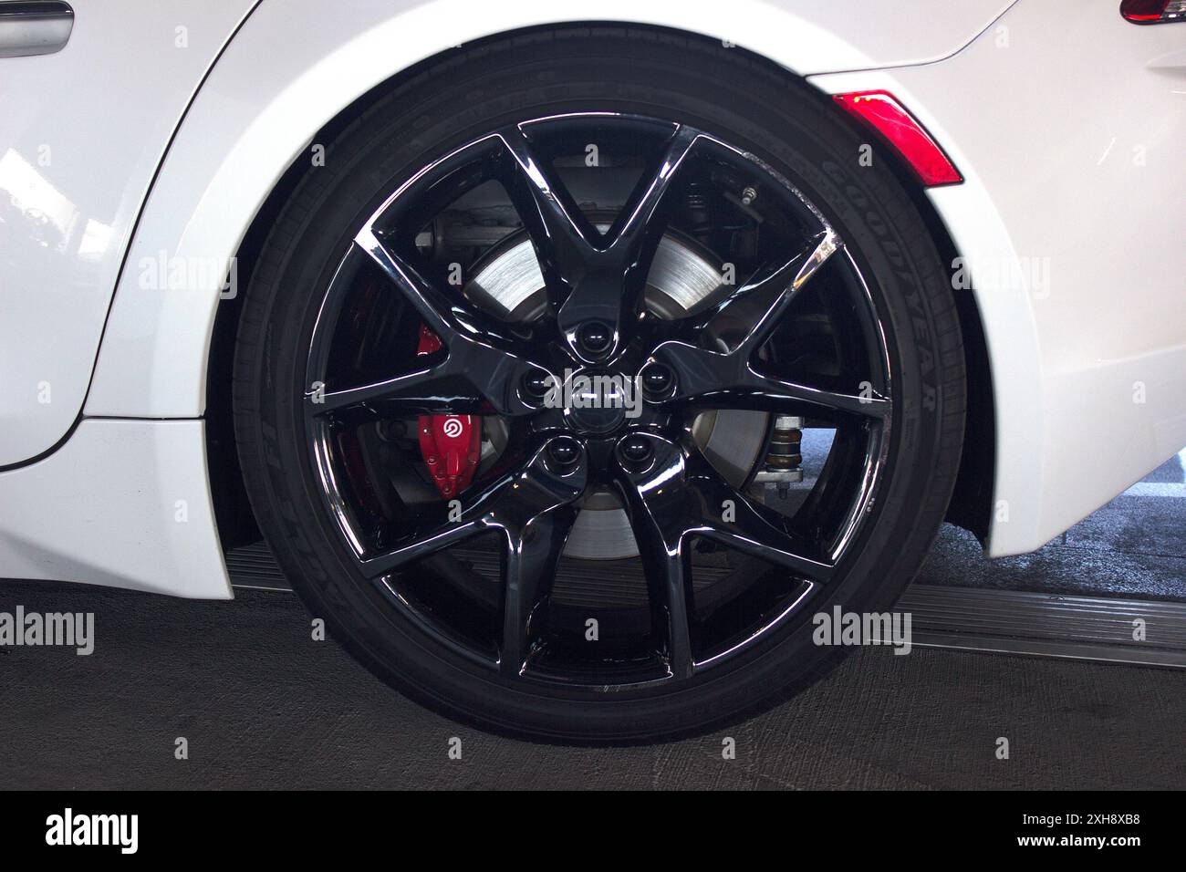 The rear, driver side wheel of a Karma Revero Stock Photo - Alamy