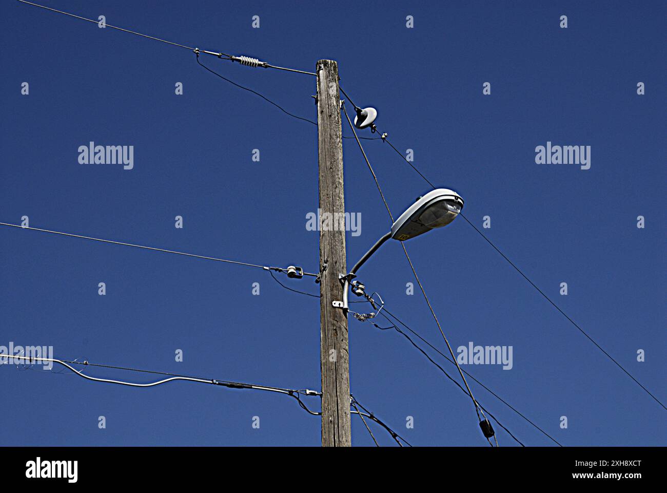 LEWISTON/IDAHO /USA- Wooden Electric pole bulb light is paid by private ...