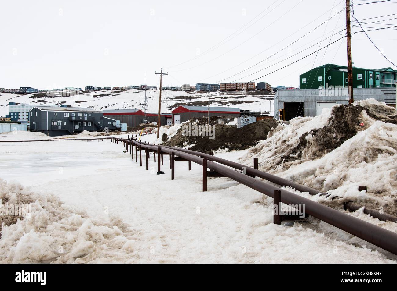 Sewer pipe lines in Iqaluit, Nunavut, Canada Stock Photo - Alamy