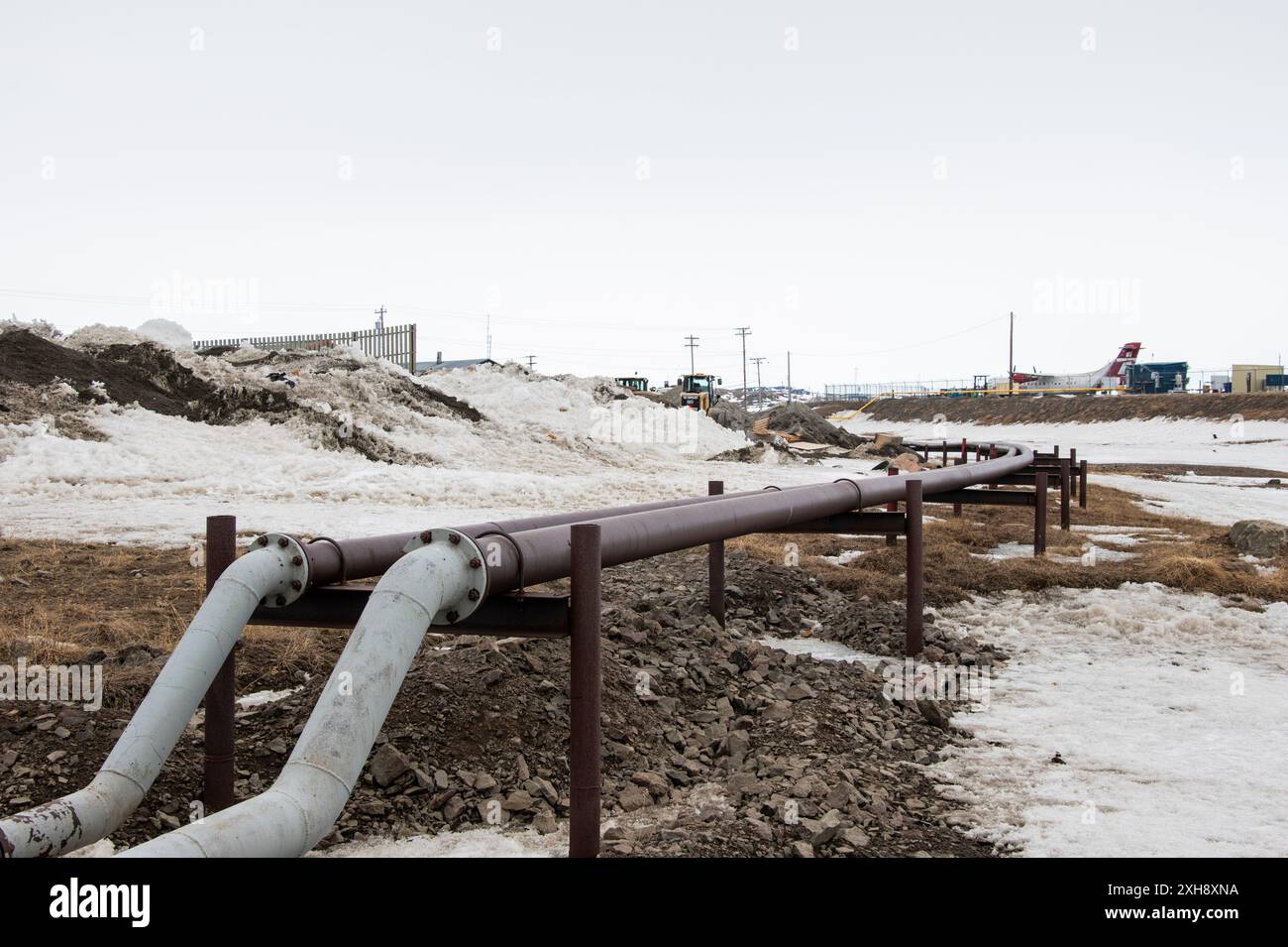 Sewer pipe lines in Iqaluit, Nunavut, Canada Stock Photo - Alamy